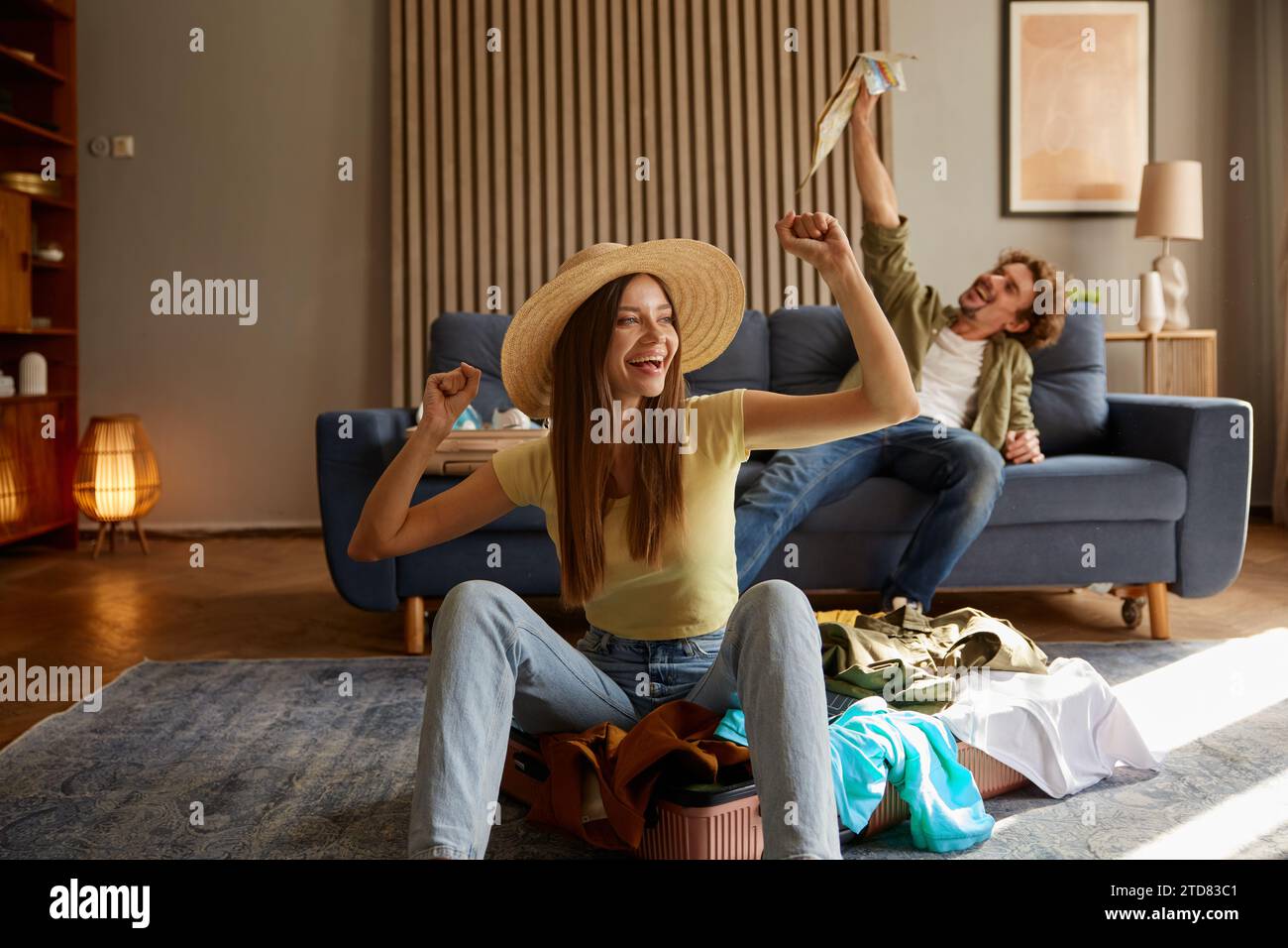Happy excited family couple ready for vacation Stock Photo - Alamy