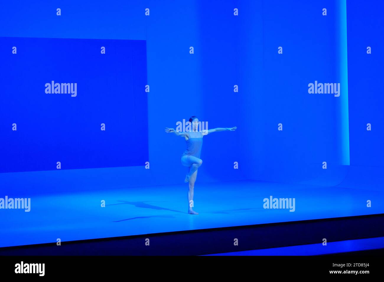 The Australian Ballet, Chroma, A solo dancer bathed in blue light, arms ...