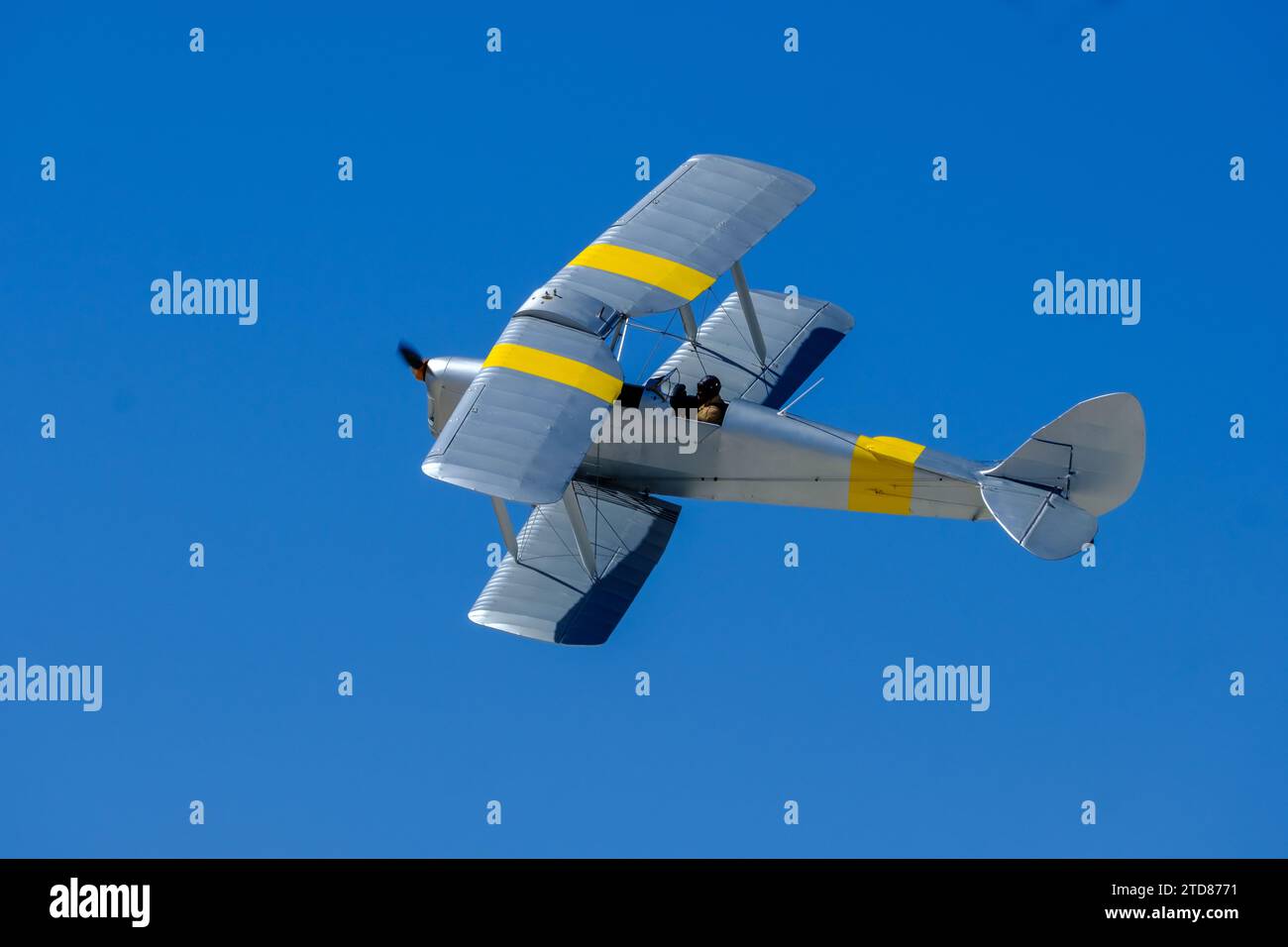 Classic old retro vintage airplane with a propeller in the sky Stock ...