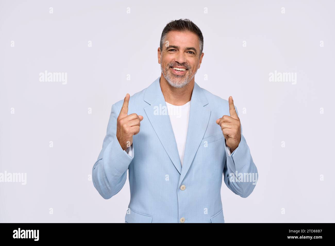 Happy middle aged business man pointing up advertising isolated on ...