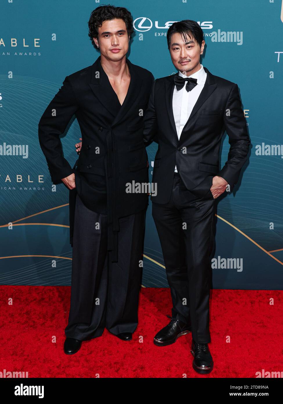 BEVERLY HILLS, LOS ANGELES, CALIFORNIA, USA - DECEMBER 16: Charles Melton and David Yi arrive at ...