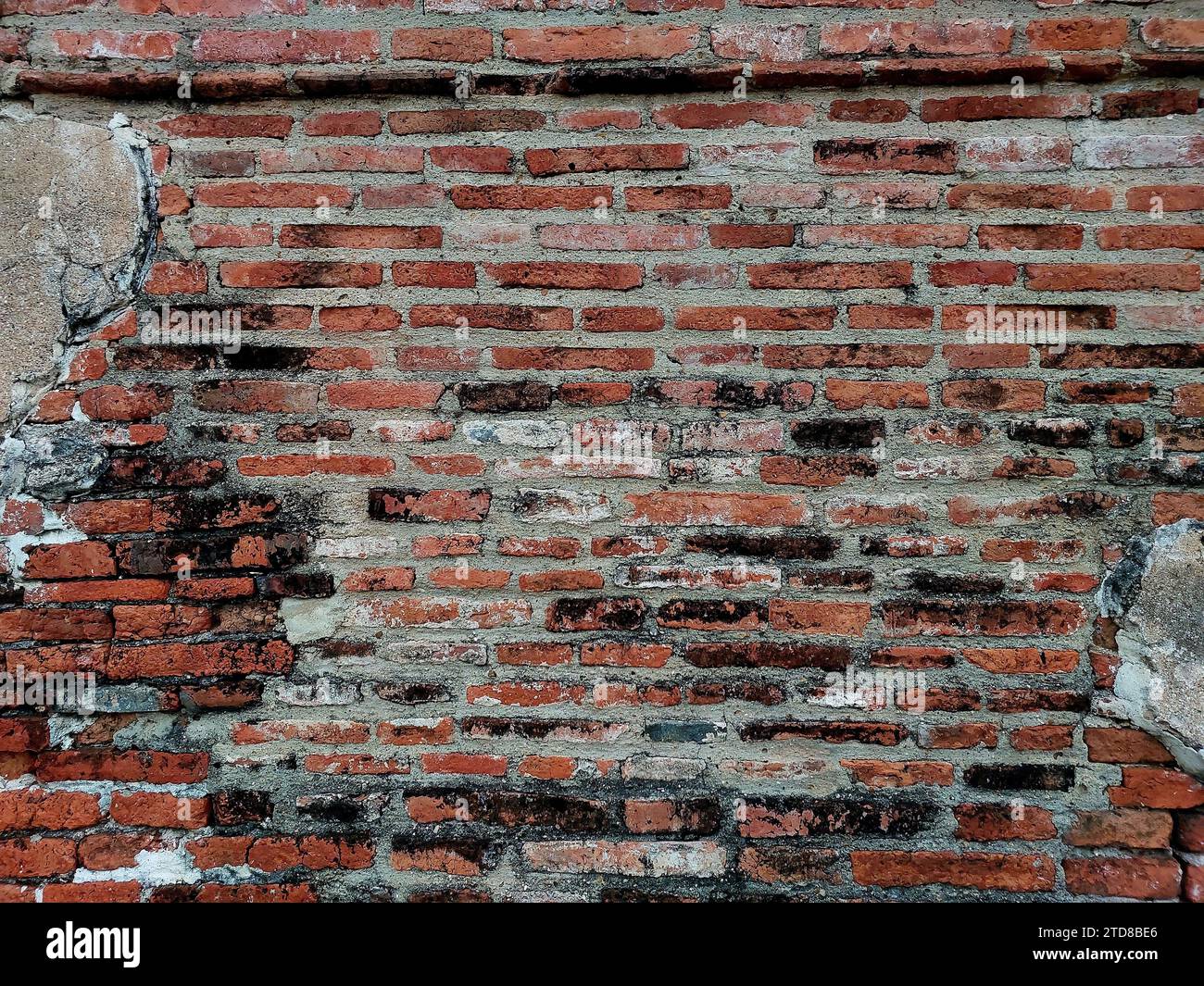 Old weathered brick wall fragment, urban background grunge wall texture ...