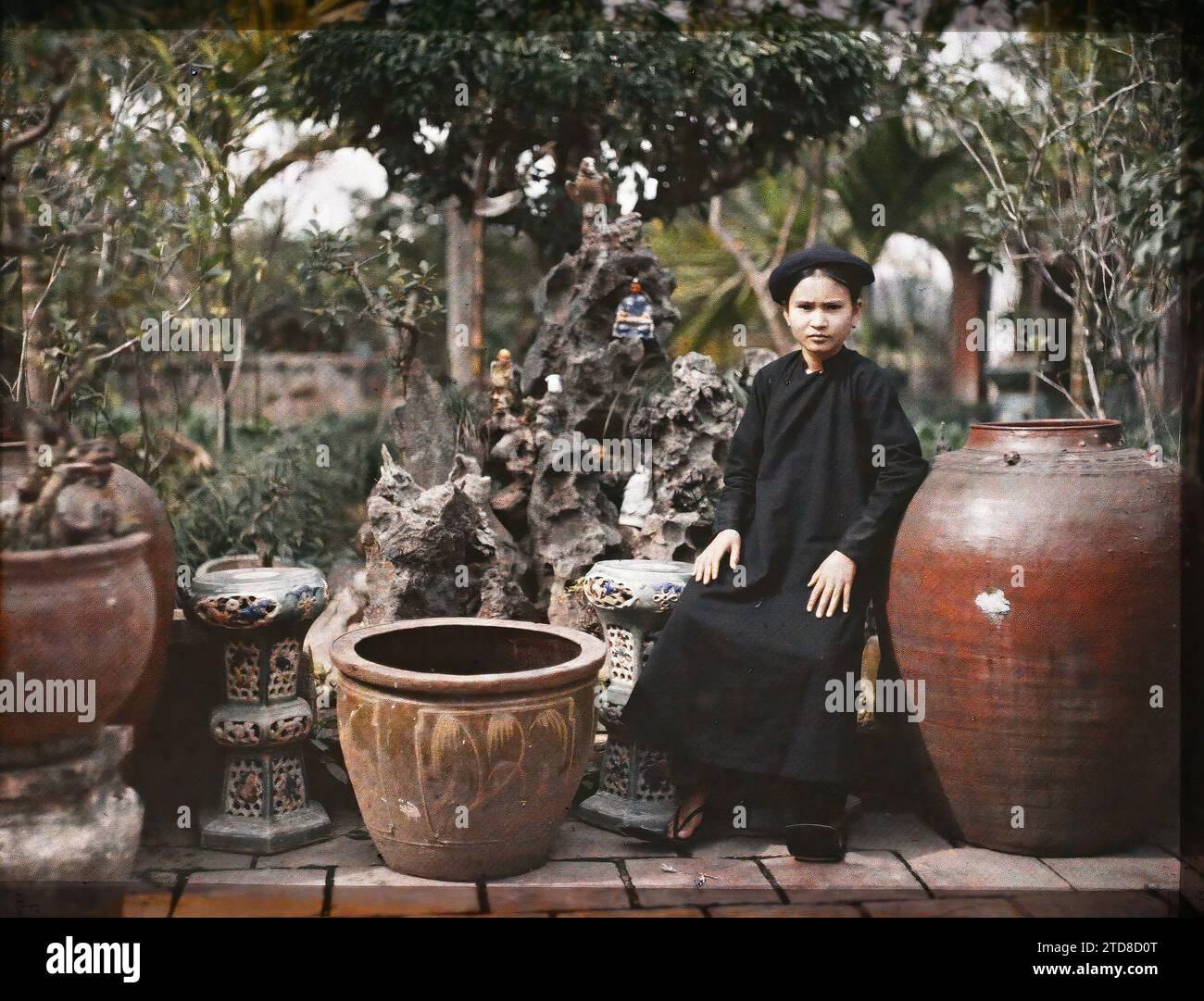 Tonkin, Indochina A young girl from a wealthy family sitting in a ...