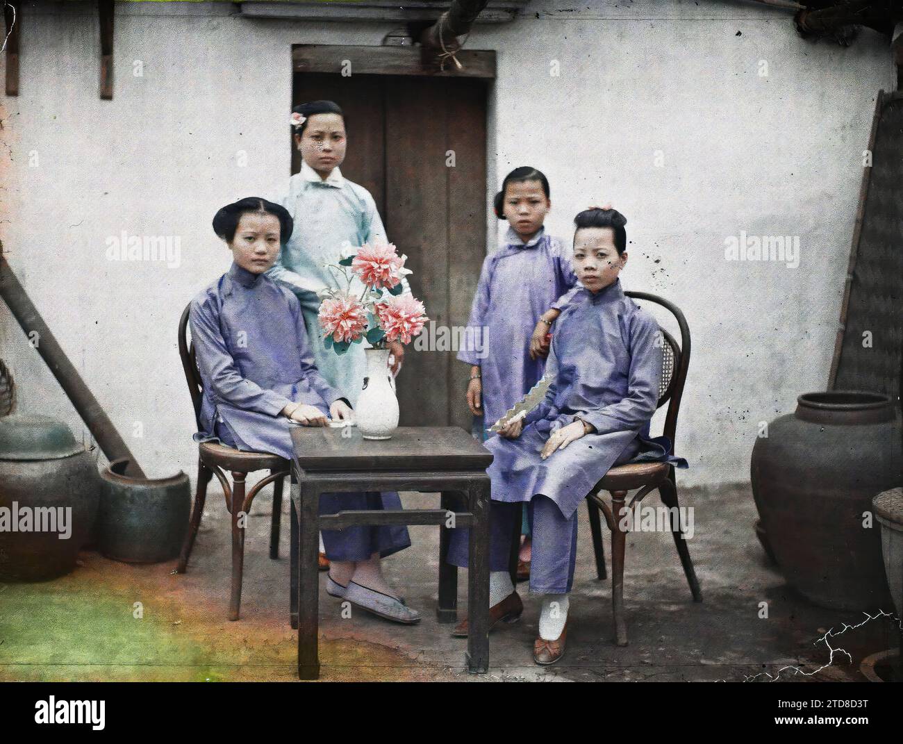 Tonkin, Indochina Four young Chinese women around a table, in an ...