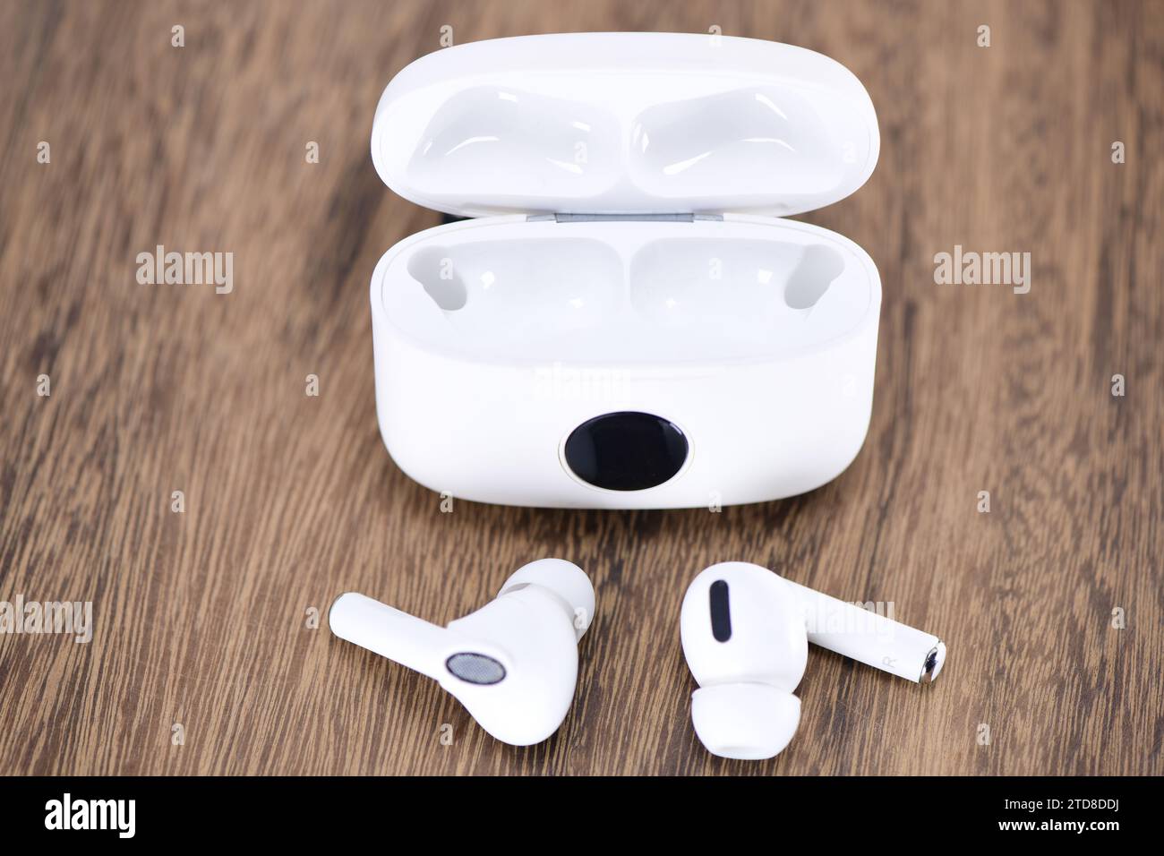 White wireless bluetooth ear pods with its charging case Stock Photo ...