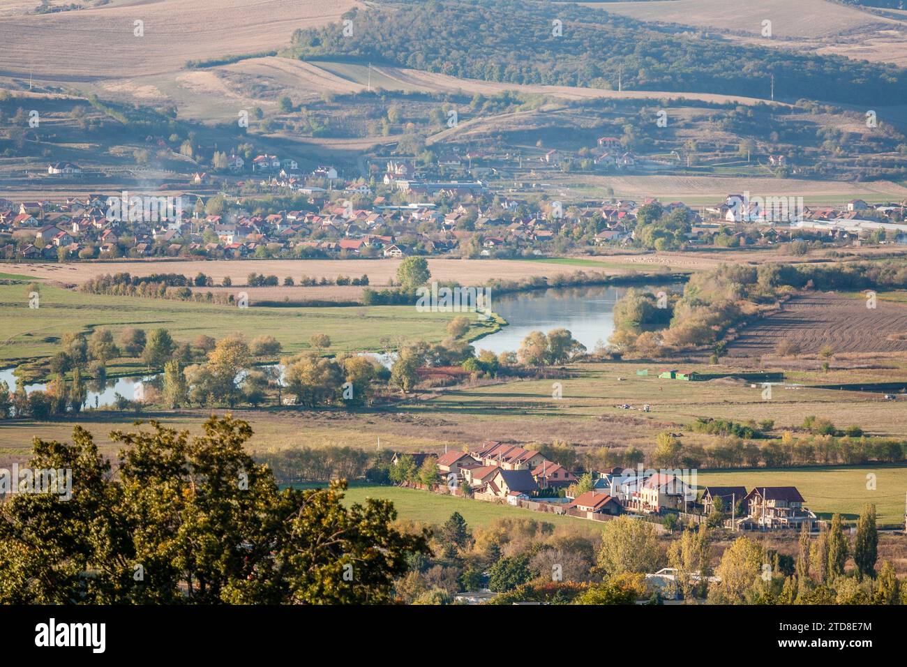 Photo of a section of Mures river crossing through inhabited plains ...