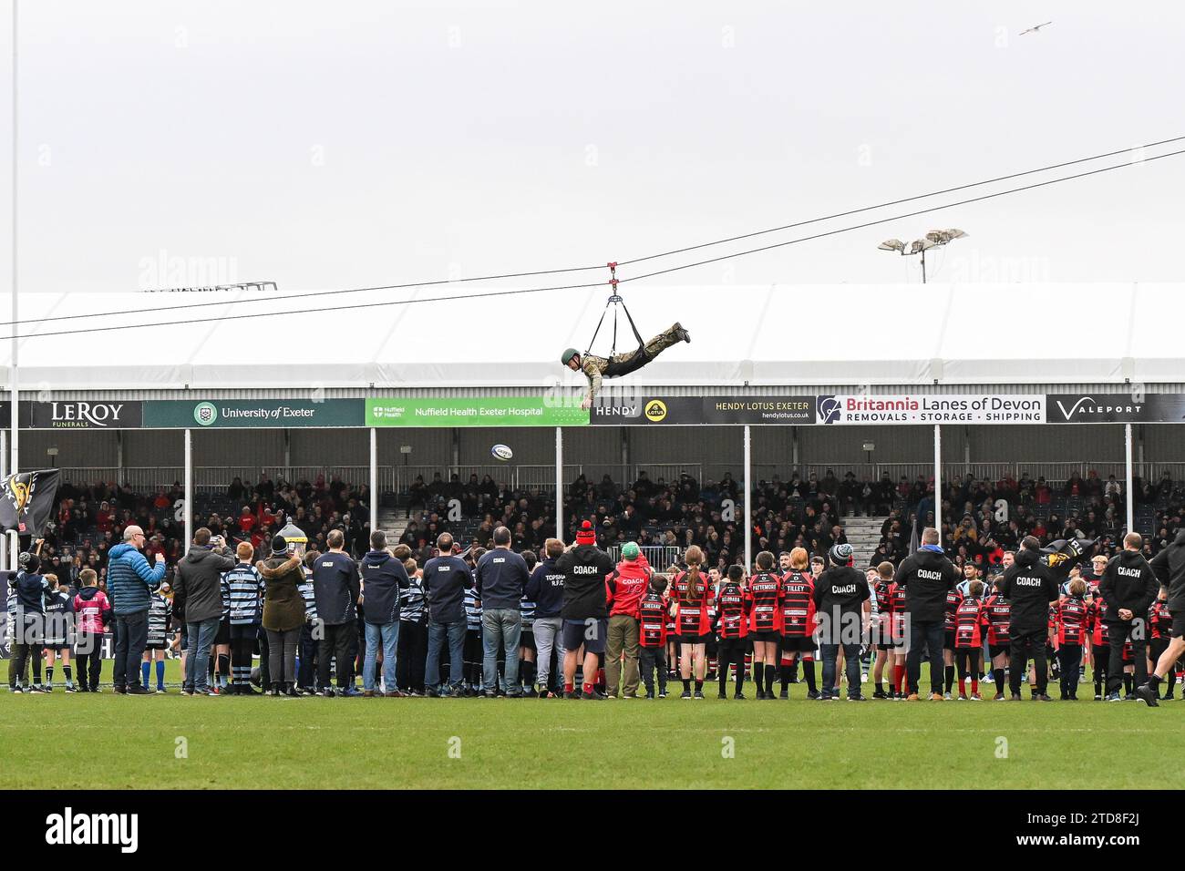 The Royal Marine Commandos deliver the match ball by zip wire during ...