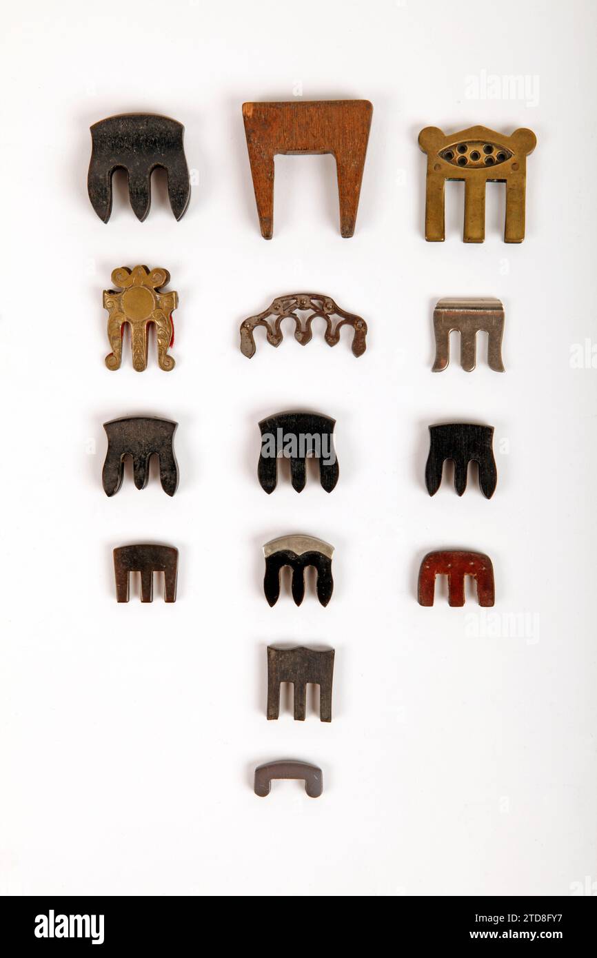 A collection of mutes for string instruments. Violin, Viola and Cello ...
