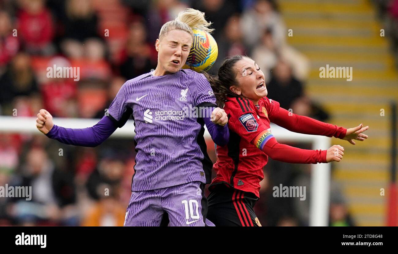 Leigh, UK. 17th Dec, 2023. Sophie Roman Haug of Liverpool (L) is ...