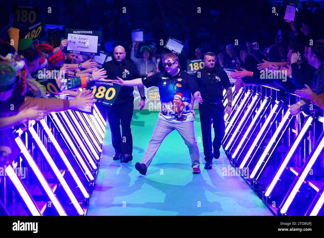 Ricky Evans walks out to play Simon Adams (not pictured) on day three ...