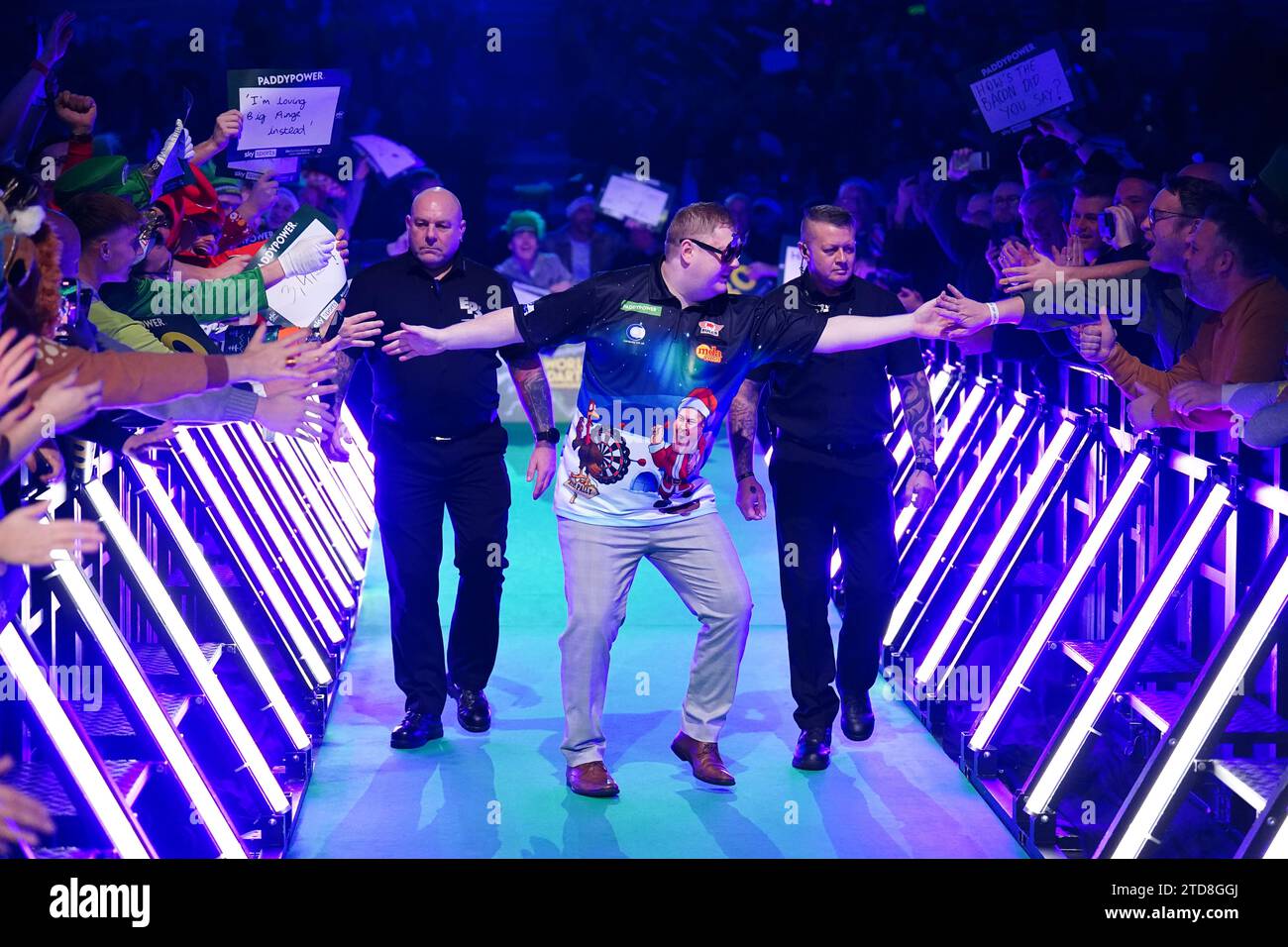 Ricky Evans walks out to play Simon Adams (not pictured) on day three ...