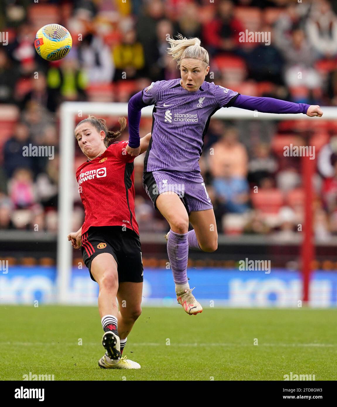 Leigh, UK. 17th Dec, 2023. Sophie Roman Haug of Liverpool (R) is ...