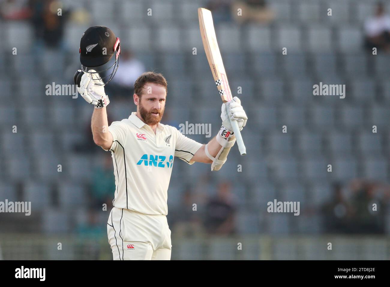 New Zealand batter Kane Williamson celebrates his hundred runs during ...