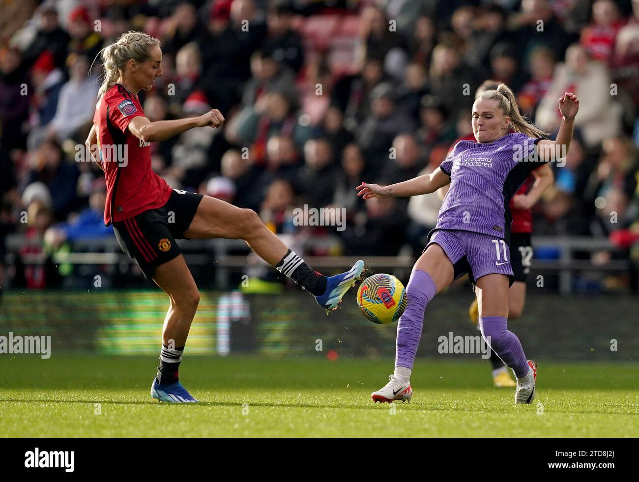 Manchester United's Millie Turner (left) and Liverpool's Melissa Lawley ...