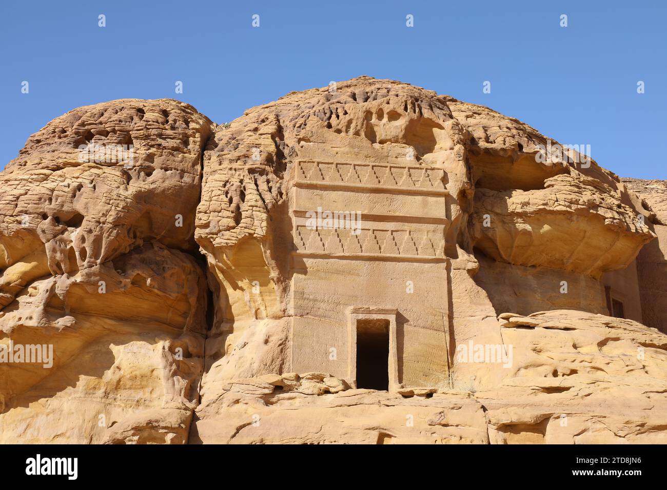 Rock cut Nabatean tomb at AlUla in Saudi Arabia Stock Photo - Alamy