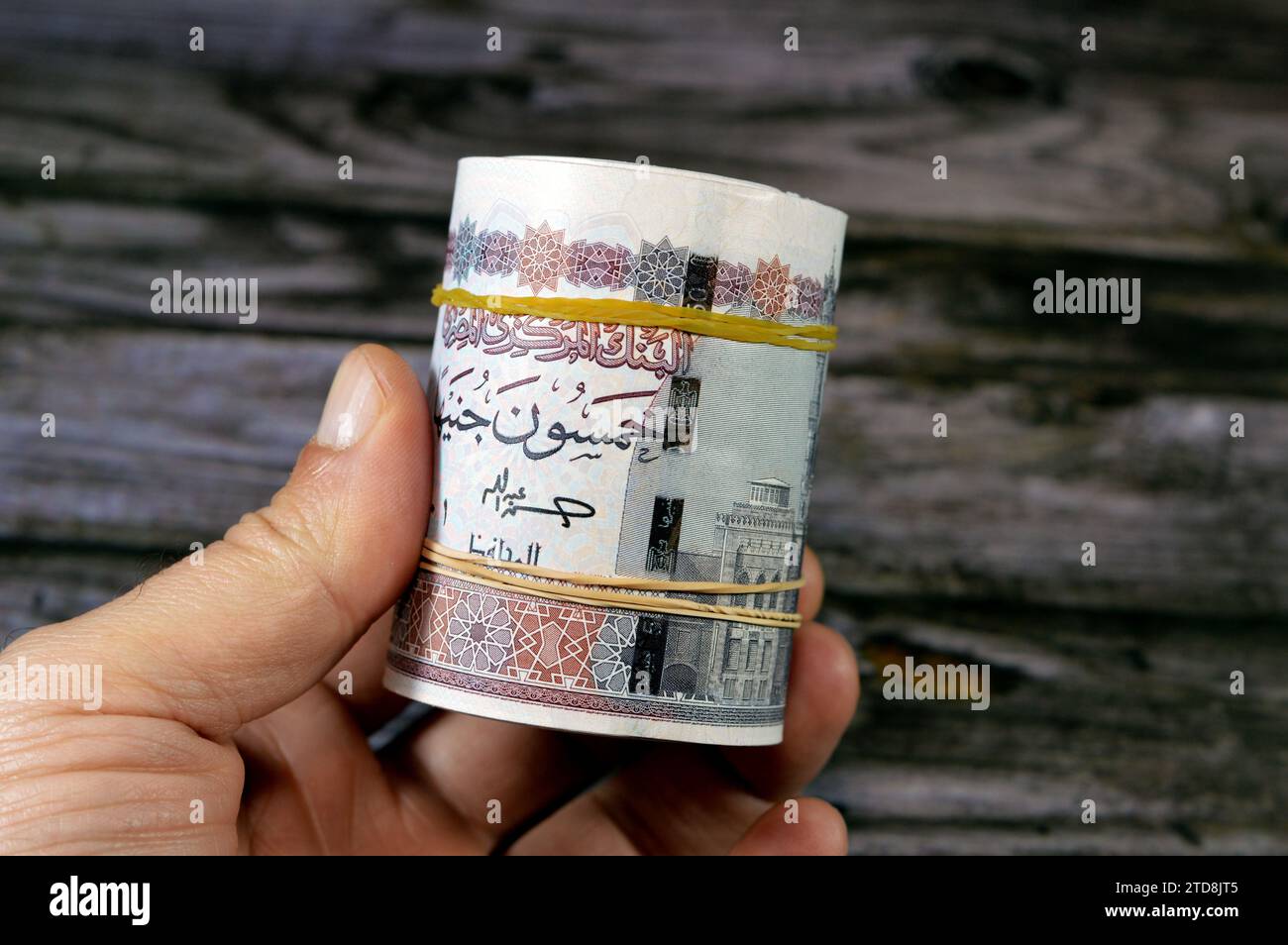 50 pound note rolled up hi-res stock photography and images - Alamy