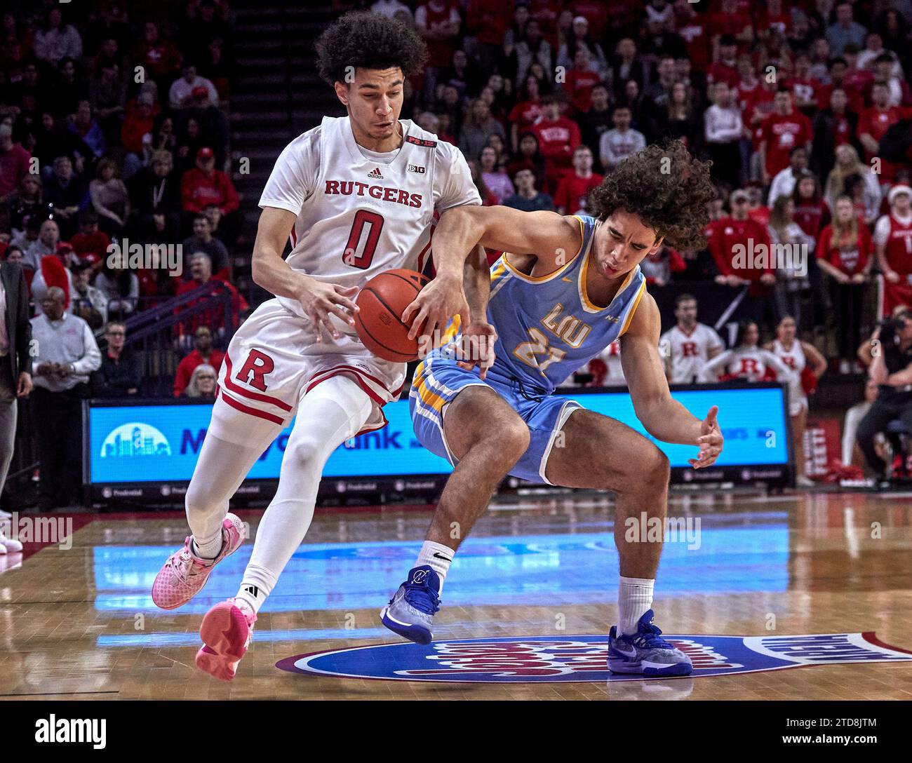 Rutgers Scarlet Knights guard Derek Simpson (0) steals the ball from ...