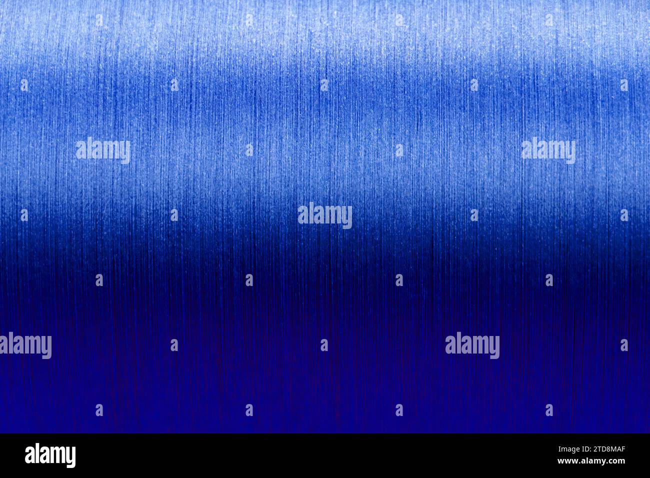 Closed up of blue color of thread textured background (Focus at center ...