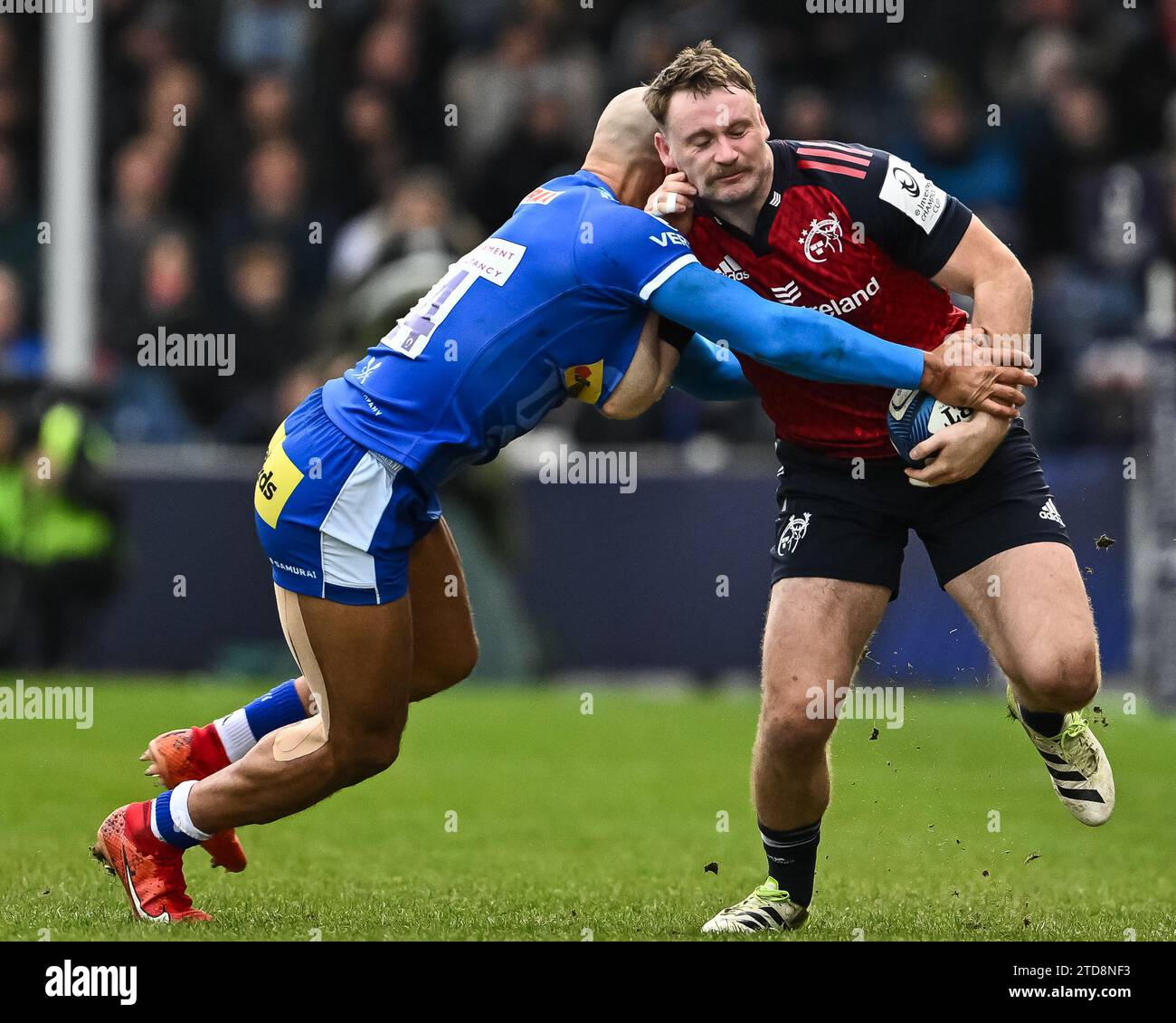 Sean O'brien of Munster is tackled by Olly Woodburn of Exeter Chiefs ...