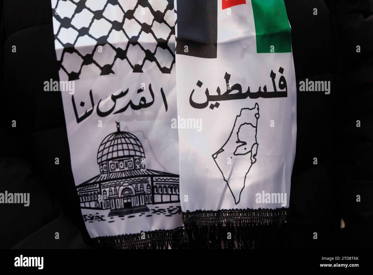 Portland, USA. 16th Dec, 2023. A scarf has images of al-aqsa mosque ...
