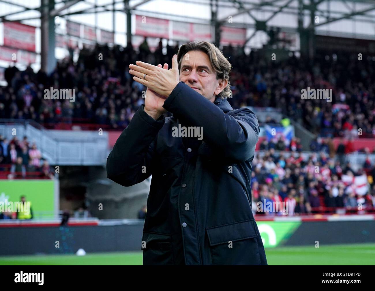 Brentford manager Thomas Frank applauds the fans ahead of the Premier ...