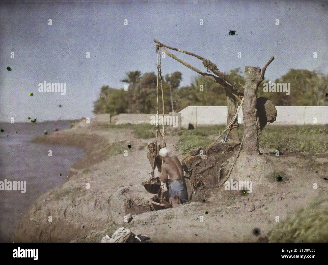 Surroundings of Louqsor, Egypt, Africa Men using a shadouf, Clothing ...