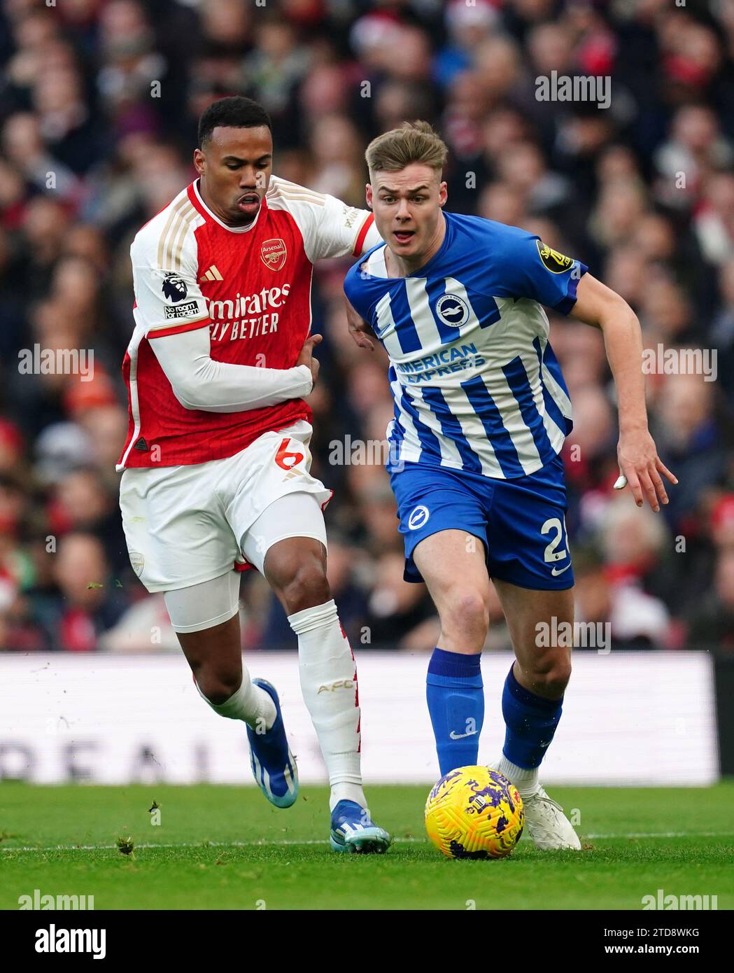 Arsenal's Gabriel (left) and Brighton and Hove Albion's Evan Ferguson ...