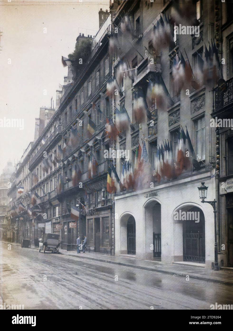 Paris (IInd arr.), France Rue de Richelieu decorated with flags, at ...
