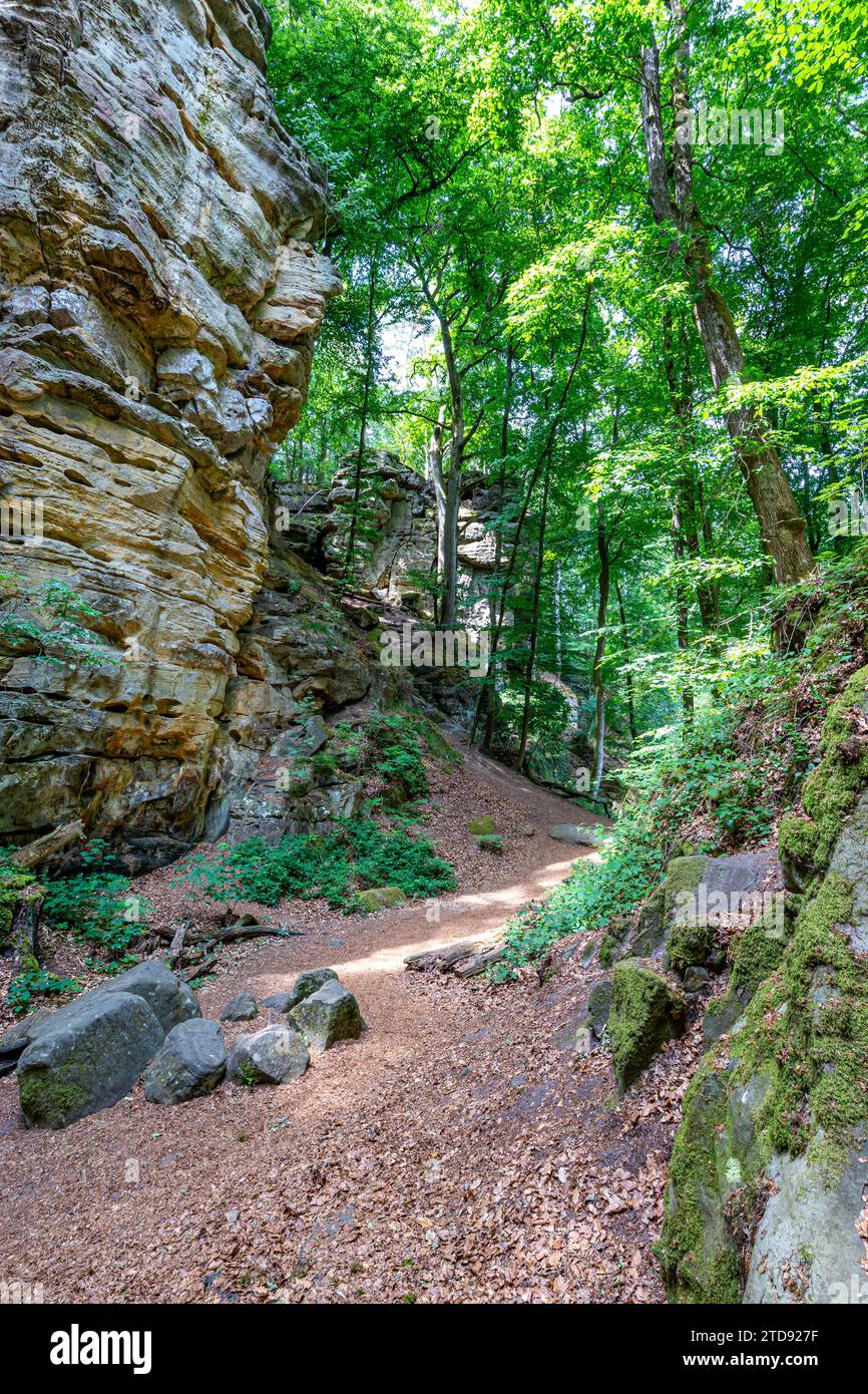 Hiking trail on a hill, rocky slope or wall of an eroded rock formation ...