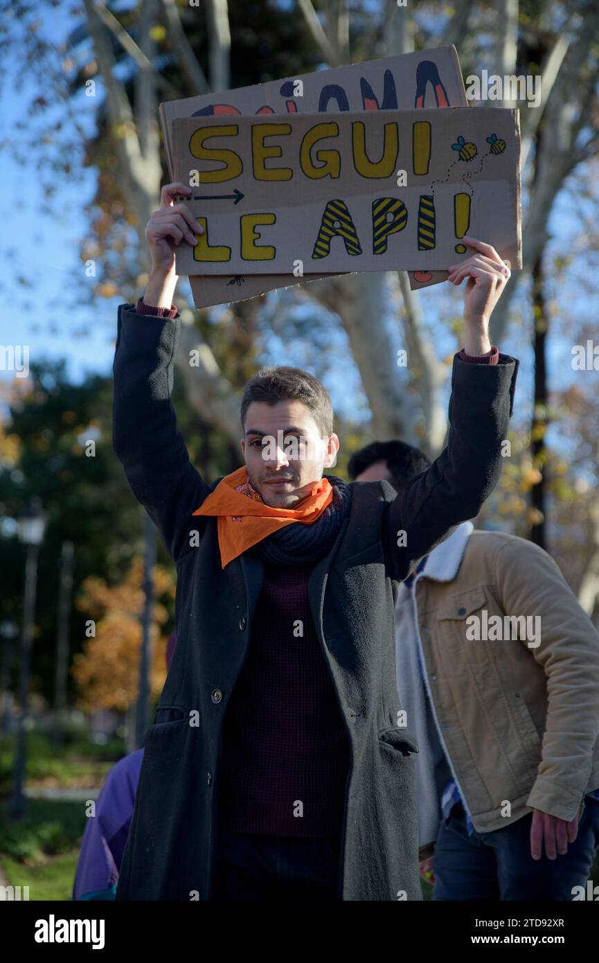 Rome, Italy. 16th Dec, 2023. A young environmental activist shows a ...