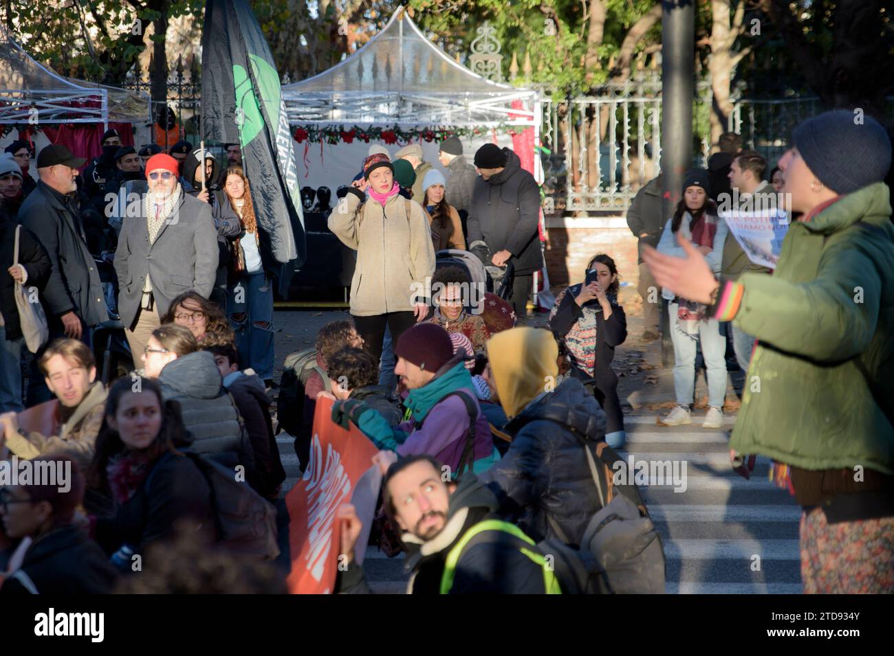 Rome, Italy. 16th Dec, 2023. A young environmental activist illuminated ...