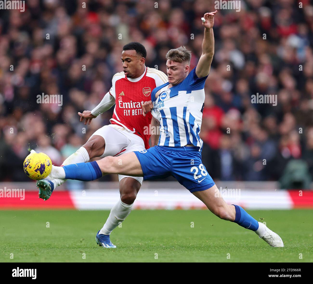 London, UK. 17th Dec, 2023. Gabriel of Arsenal with Evan Ferguson of Brighton during the Premier ...