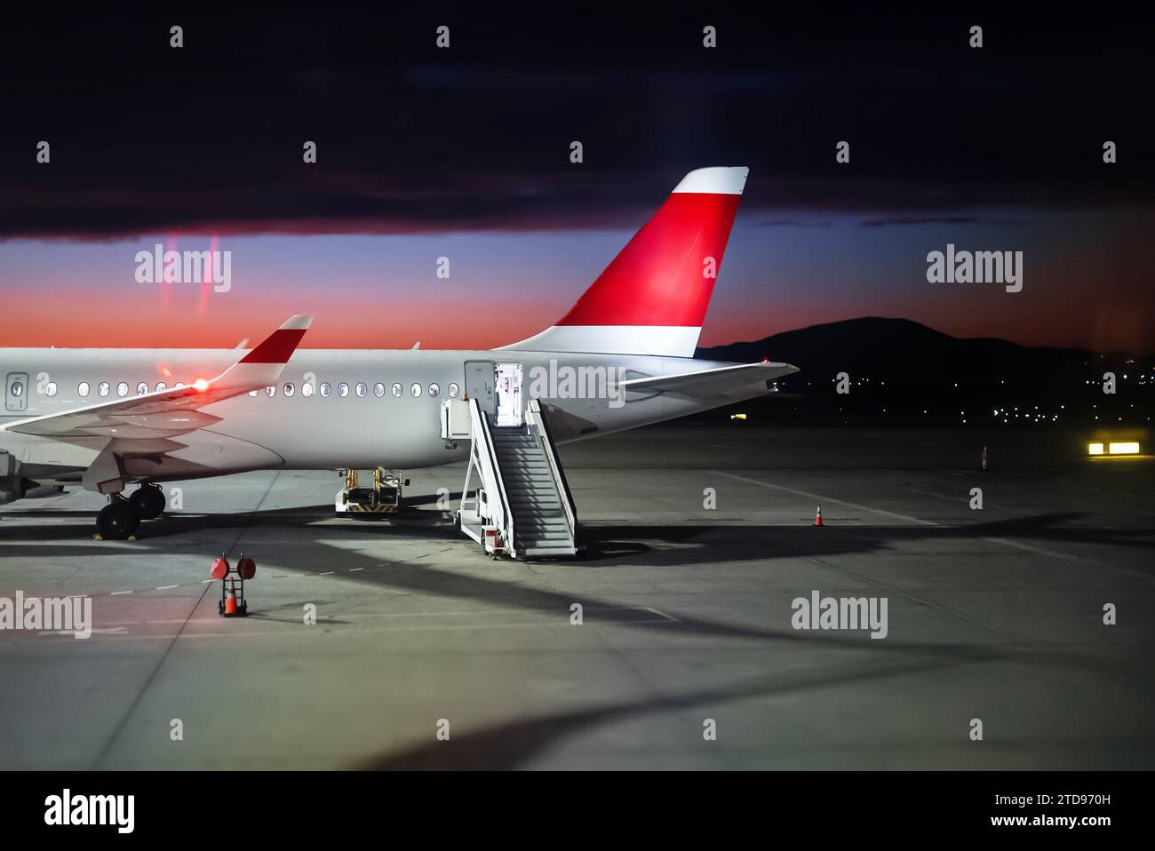 Welcome aboard! Airplane with a ramp at the airport Stock Photo - Alamy