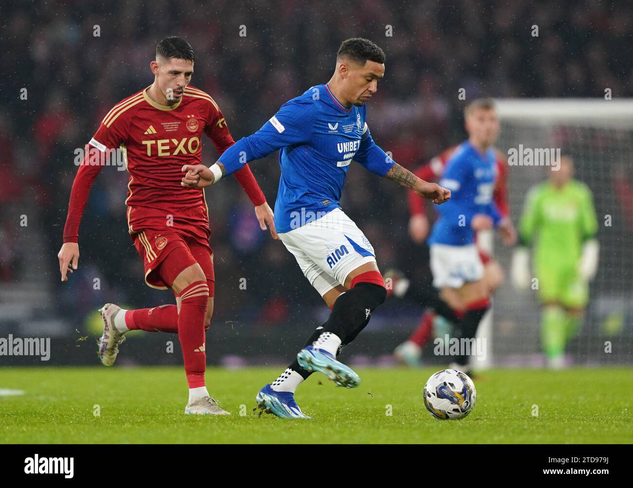 Aberdeen's Ester Sokler (left) and Rangers' James Tavernier in action ...