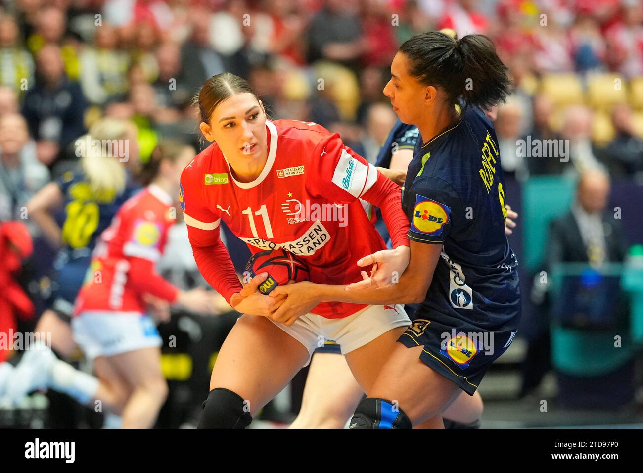 Denmarks Line Haugsted, left, and Swedens Jamina Roberts fight for the ...