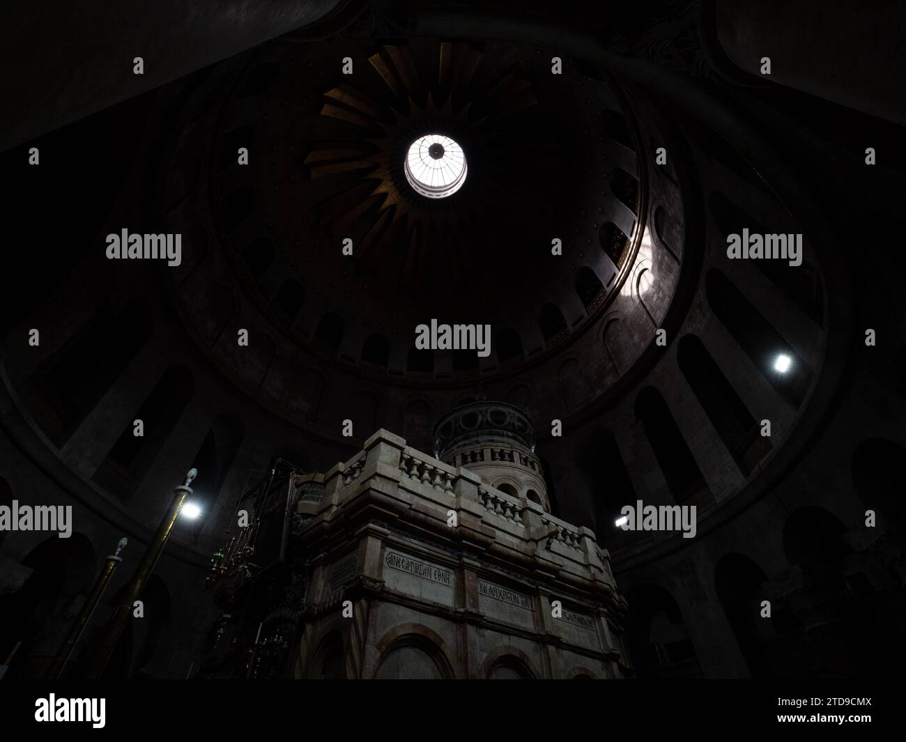 View in semi-darkness of the Aedicula and the main dome of the Church ...