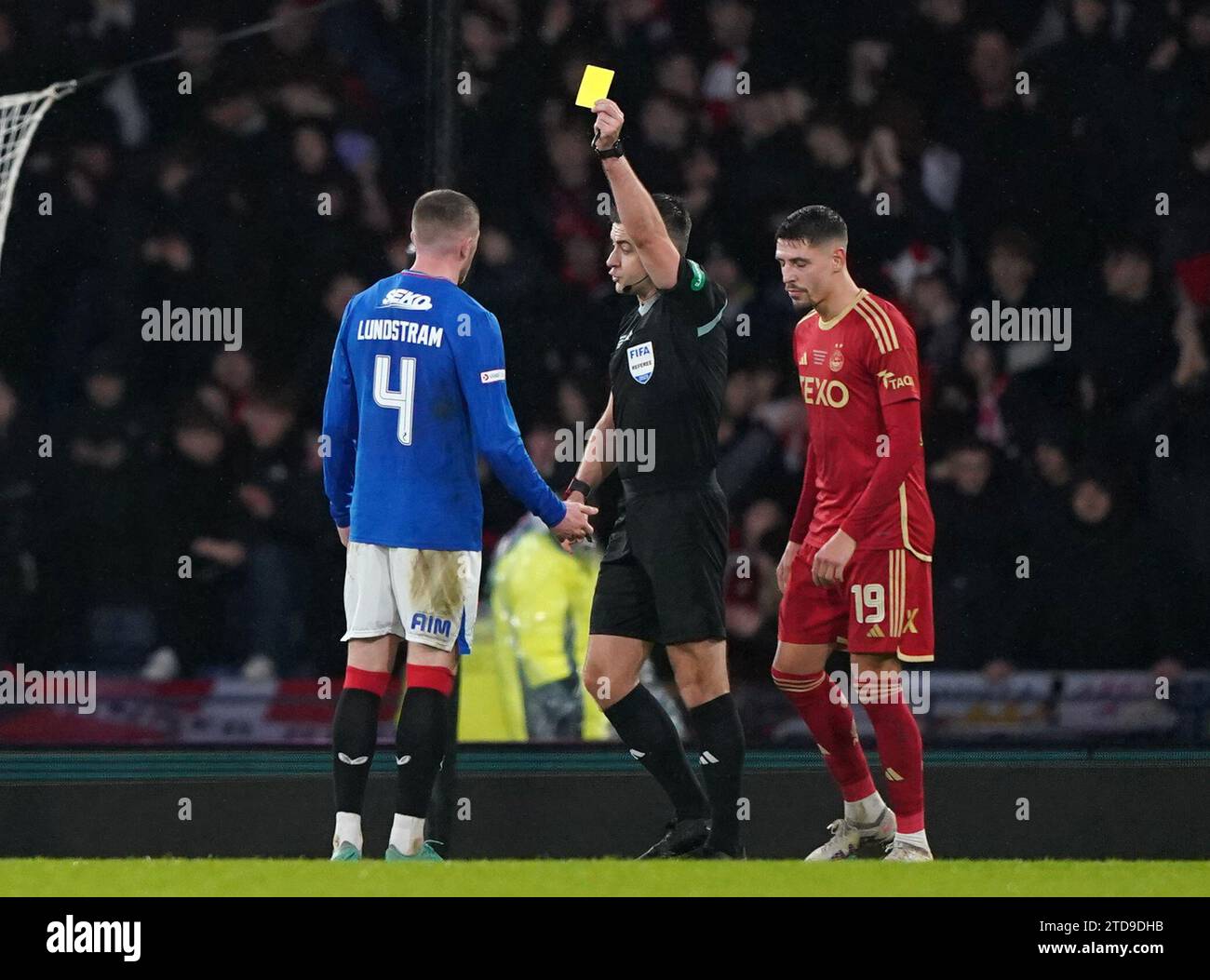 Rangers' John Lundstram (left) and Aberdeen's Ester Sokler are show ...