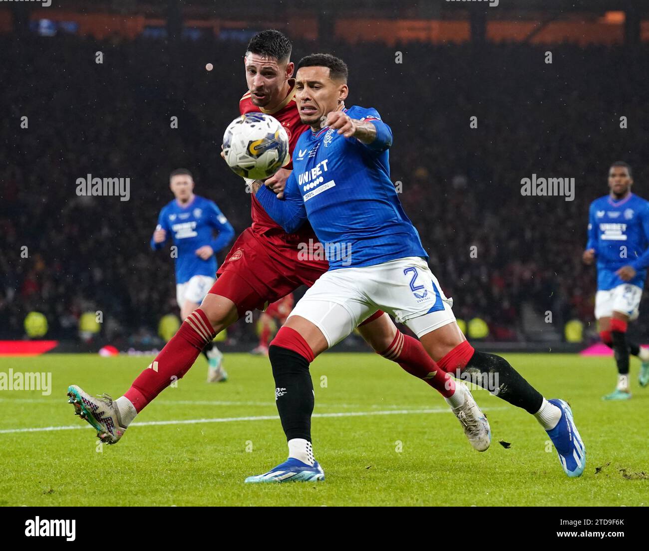 Rangers' James Tavernier (right) and Aberdeen's Ester Sokler battle for ...