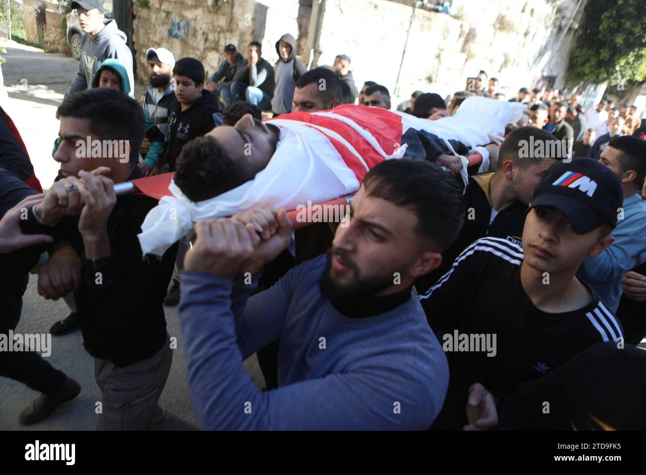 Palestinians mourn the bodies of Aziz Abd al-Rahim Aziz Akhlail, 20 ...