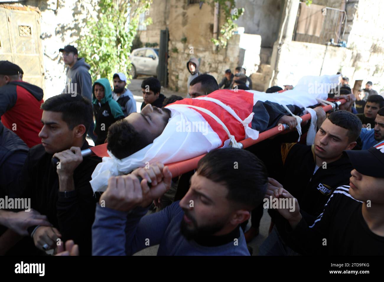 Palestinians mourn the bodies of Aziz Abd al-Rahim Aziz Akhlail, 20 ...
