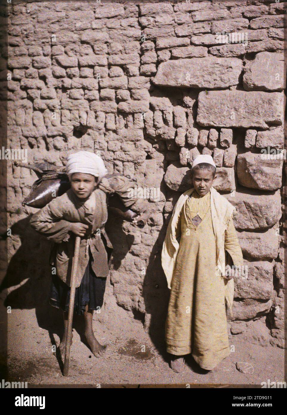 Louqsor, Egypt, Africa Two children on a city street, Clothing ...