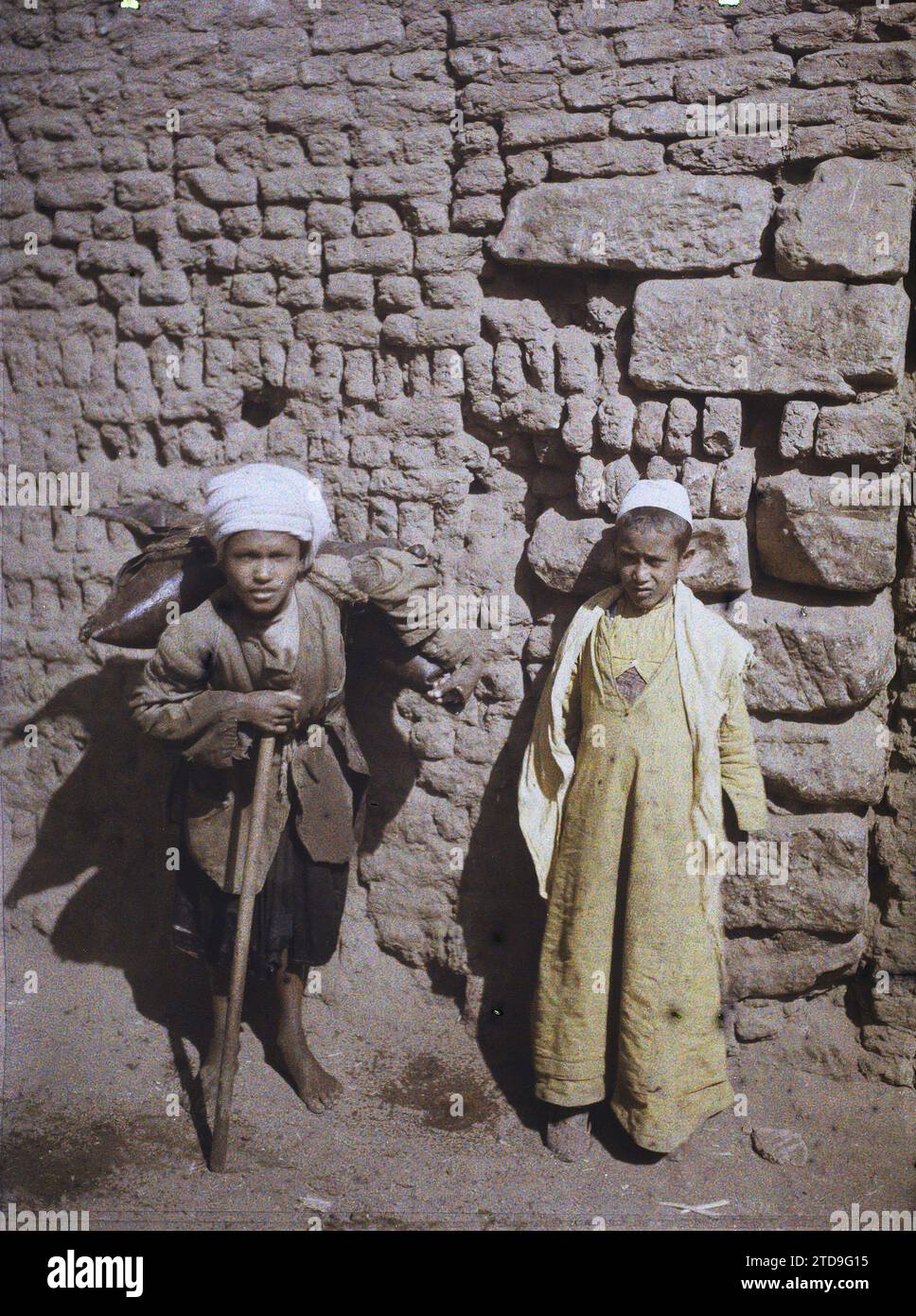 Louqsor, Egypt, Africa Two children on a city street, Clothing ...
