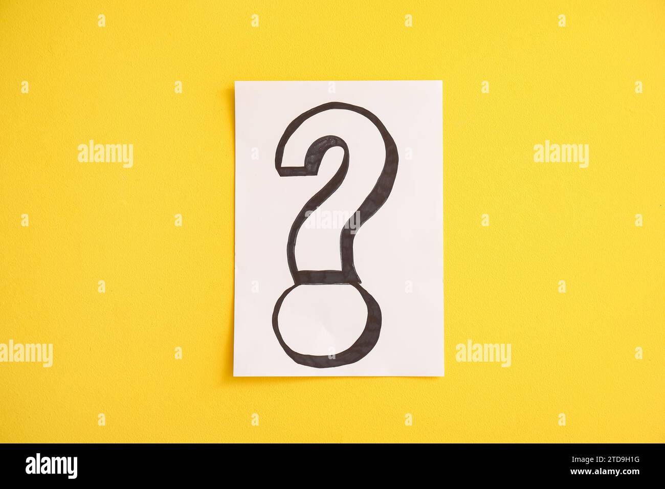 Paper with question mark on yellow background Stock Photo - Alamy