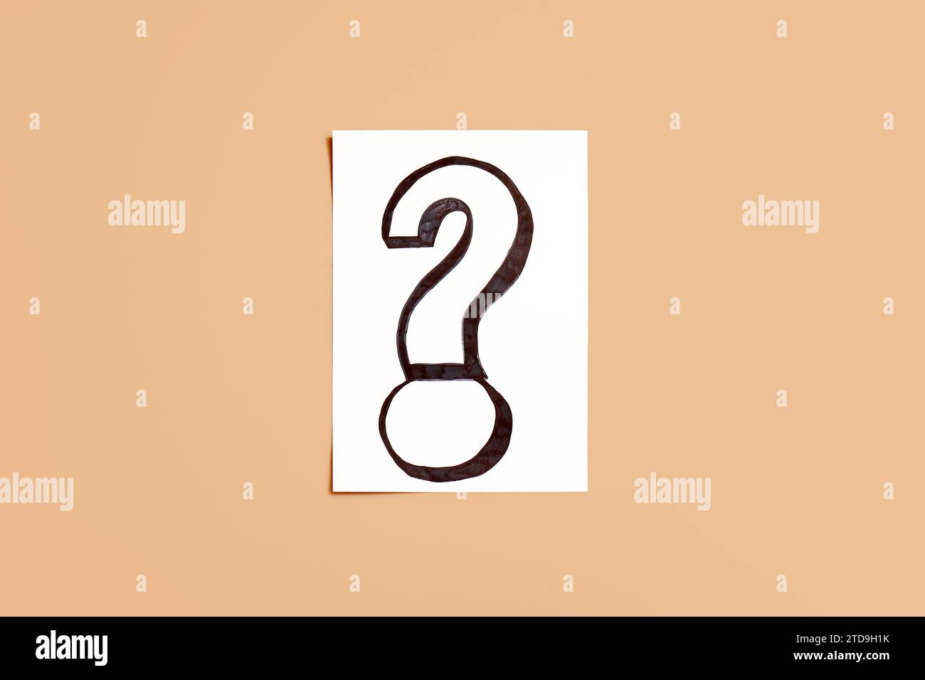 Paper with question mark on beige background Stock Photo - Alamy