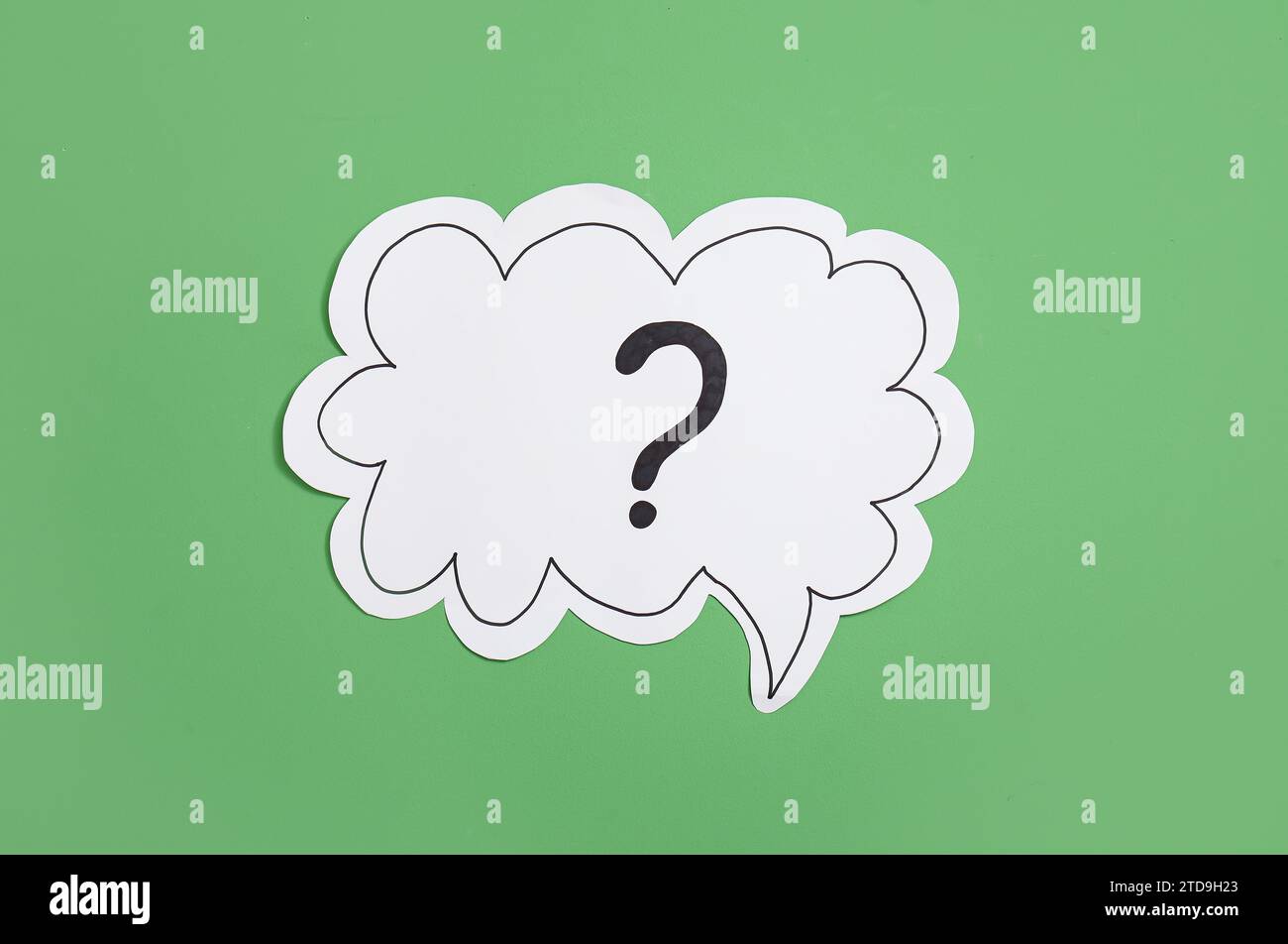 Paper speech bubble with question mark on green background Stock Photo ...