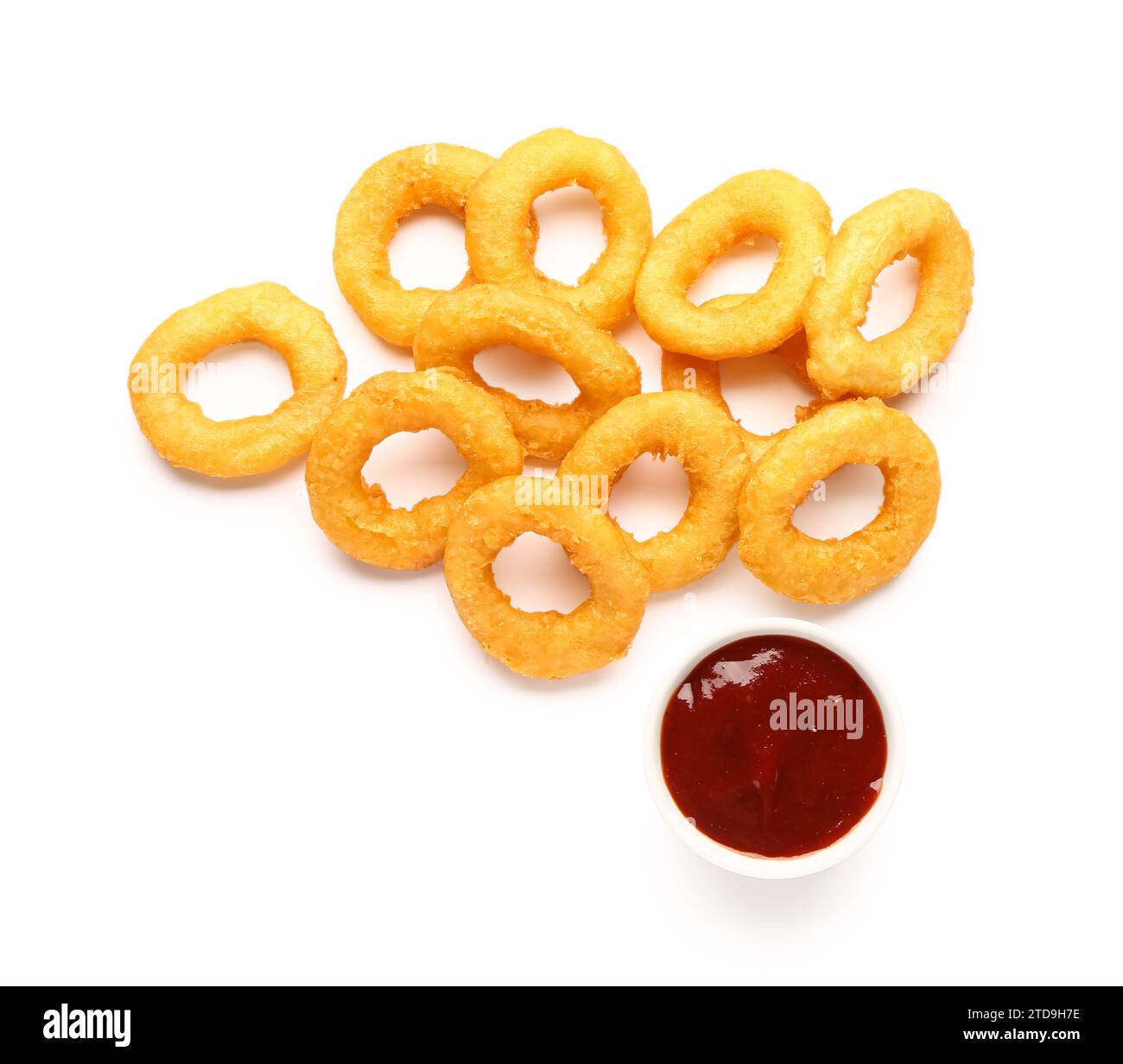 Fried breaded onion rings with ketchup on white background Stock Photo ...