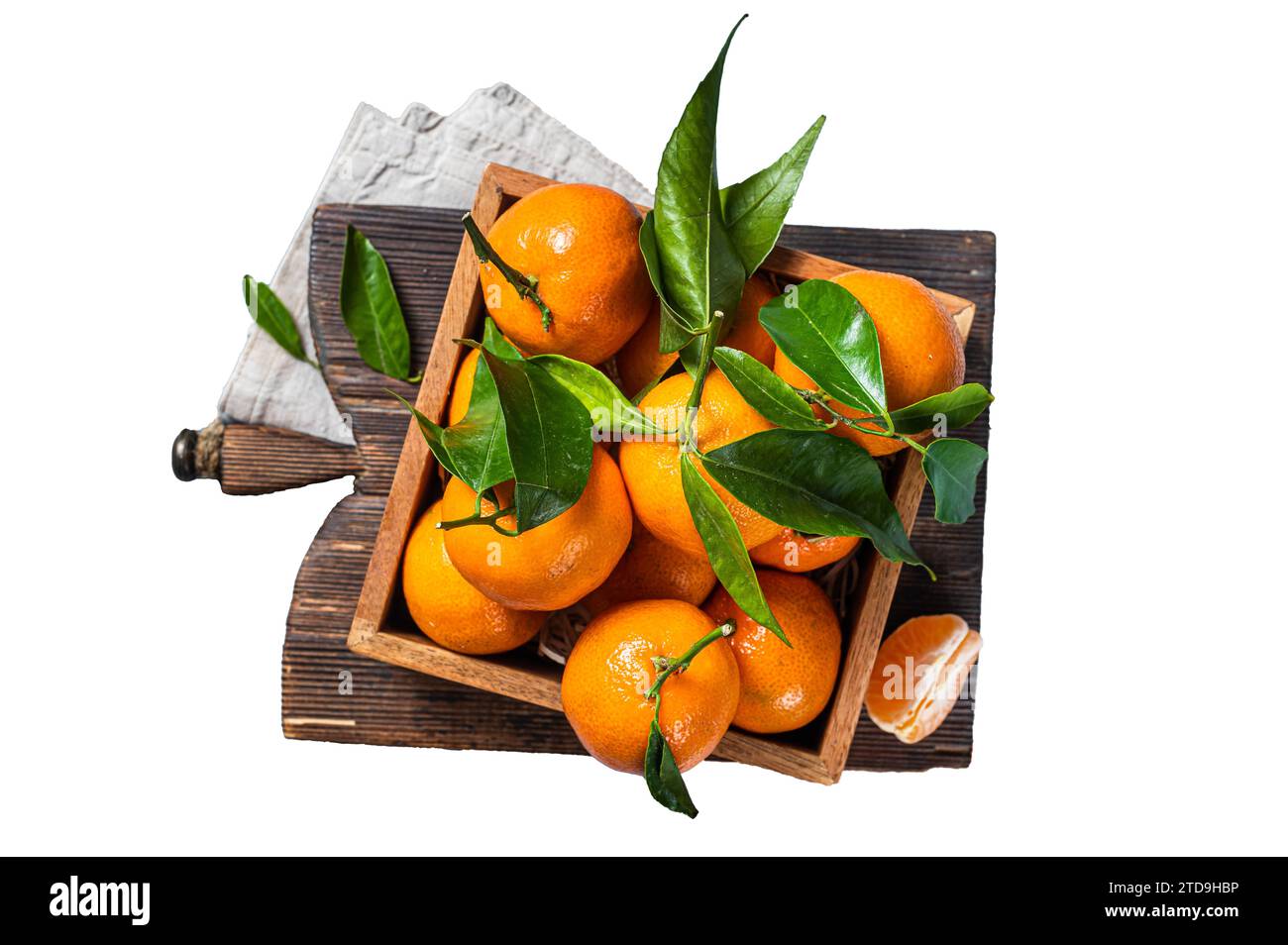 Organic Tangerines, mandarins with green leaves in wooden box. Isolated ...