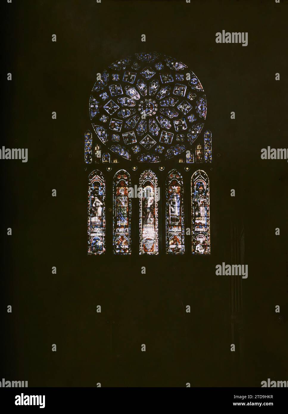 Chartres, France The stained glass windows of the north rose window or ...