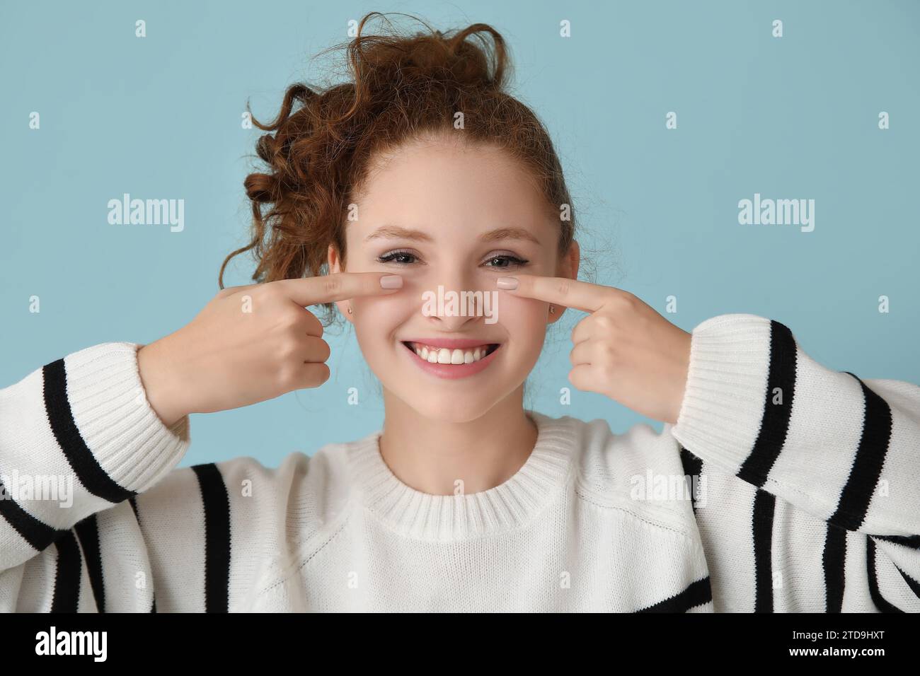 Pointing nose girl hi-res stock photography and images - Alamy