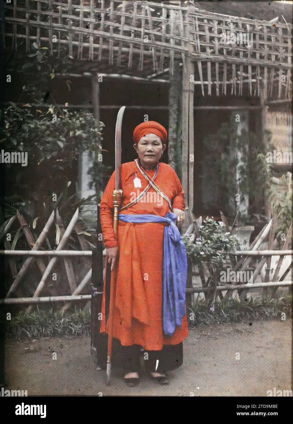 Tonkin, Indochina A woman standing, in ceremonial dress, Human beings ...
